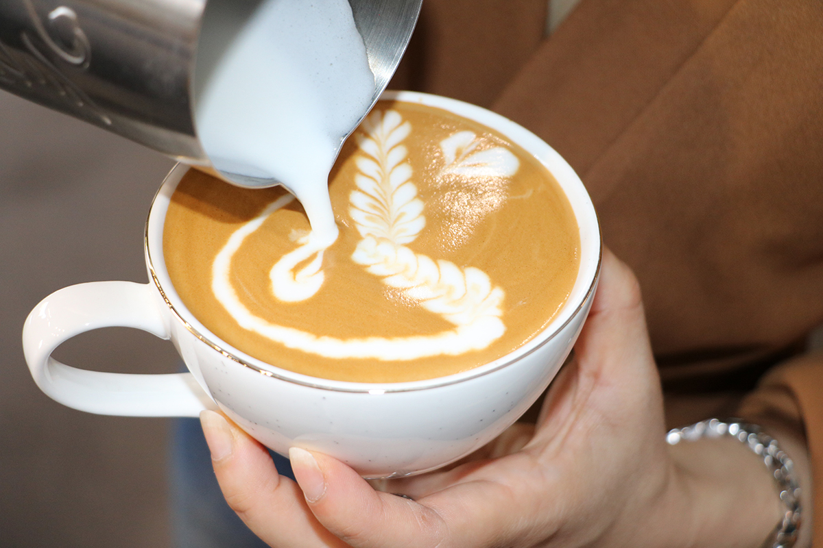 Little Red Riding Hood latte art by Jibbi Little - BeanScene