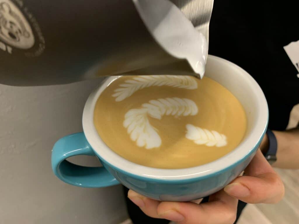 Slinky Dog latte art by Amy Zhang - BeanScene